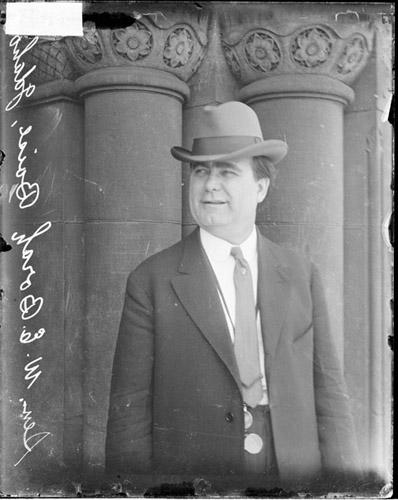 ECC | [William Edgar Borah of Boise, Idaho, standing outside a bui