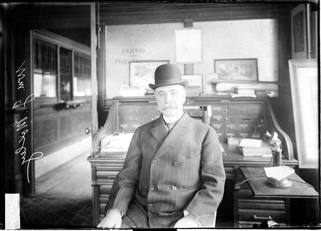 ECC | [William J. Moxley, wearing a hat]