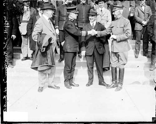 ECC | [Colonel Nicholson and Commandant Captain Moffett, shaking h