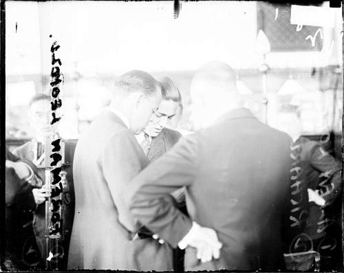 ECC | [Allan Loeb, Richard Loeb, and another man standing in a cro