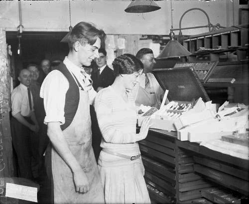 ECC | [Joe Casper and his wife smiling, standing at a long table i
