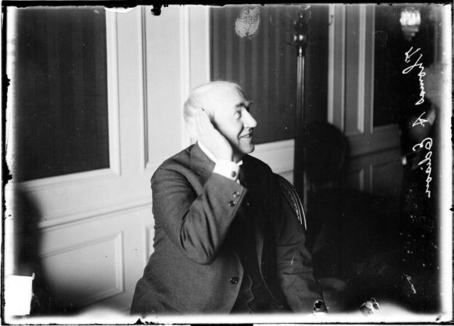 ECC | [Inventor Thomas A. Edison, sitting and holding his hand up