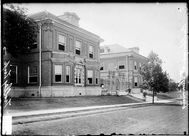 ECC | [Building with a large gate at the center at Chicago State H