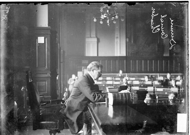 ECC | [Mayor Edward F. Dunne sitting at the speaker's desk in the