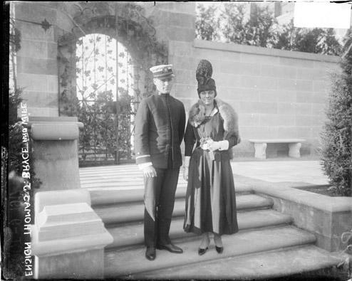 ECC | [Ensign and Mrs. Thomas J. Bryce standing on cement steps in