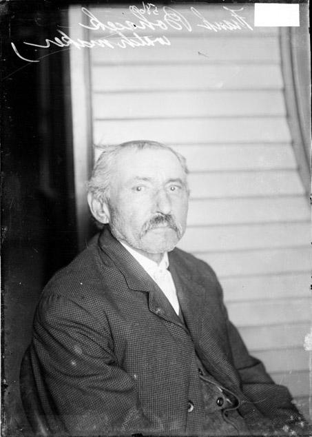 ECC | [Frank Bohacek, a watchmaker, sitting, half-length portrait]