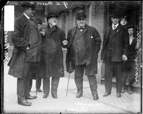 ECC | [Fred A. Busse, ex-mayor, standing with Gustave A. Busse, Ge