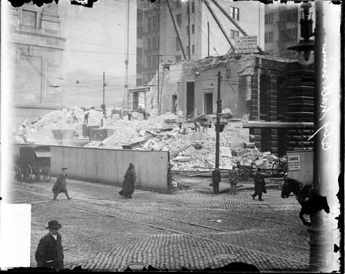 ECC | [Building debris from the demolition of the old City Hall bu