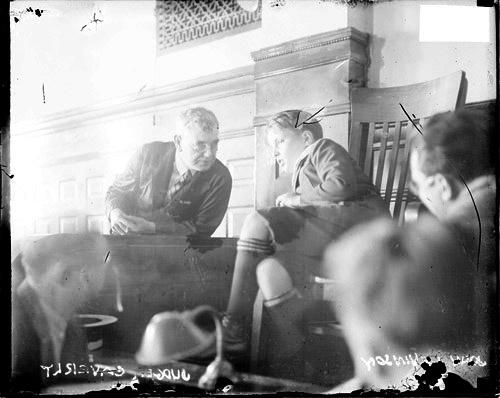 ECC | [Judge John R. Caverly leaning over and talking to John Levi