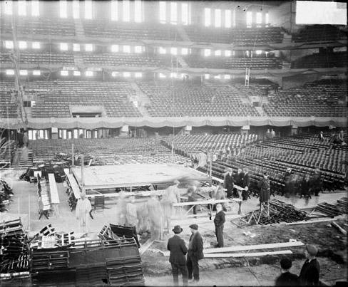 ECC | [Interior of Chicago Stadium with boxing ring being set up]