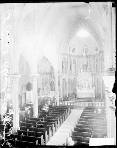 ECC | [Nave of St. Joseph and St. Anne's Church with people]