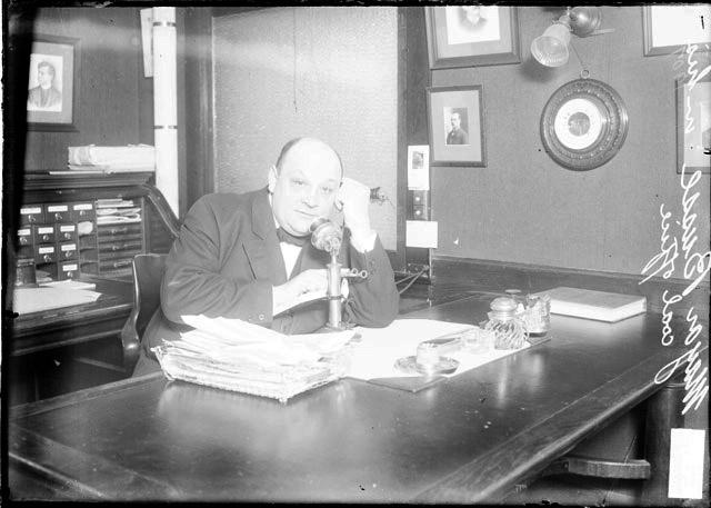 ECC | [Mayor Fred A. Busse talking on the telephone in his coal co
