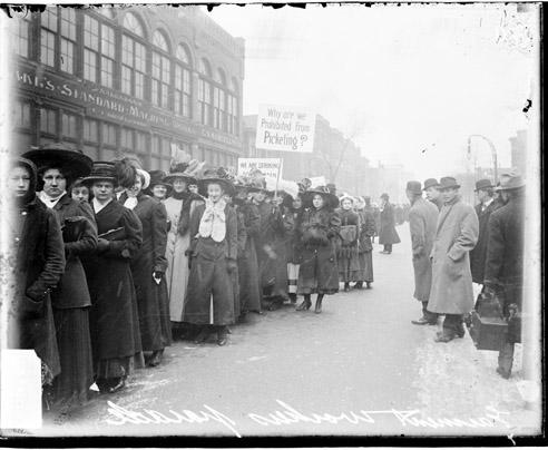 ECC | [Garment workers strike, women lining up for protest parade]