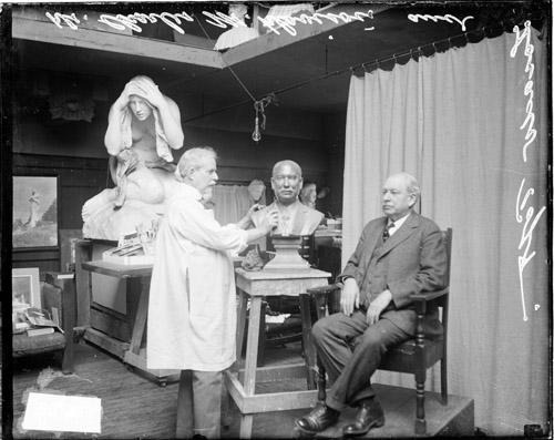 ECC | [Sculptor Lorado Taft sculpting a bust of Charles M. Davidso