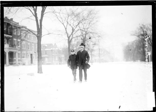 ECC | [Alderman Joseph Badenoch and an unidentified boy walking al