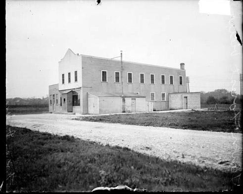 ECC | [Long building sitting off of a dirt road in Forest View, Il
