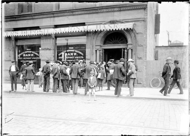 ECC | [Men and boys gathering in front of the Drovers Deposit Nati