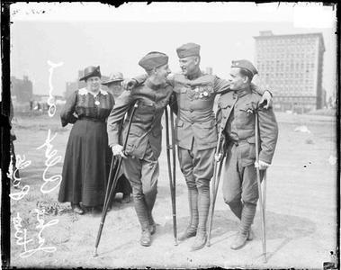 ECC | [Sergeant Jake Allex and two unidentified men, all in milita