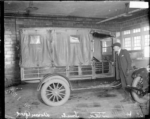 ECC | [Arthur W. Cutten's home with a truck parked in the garage]