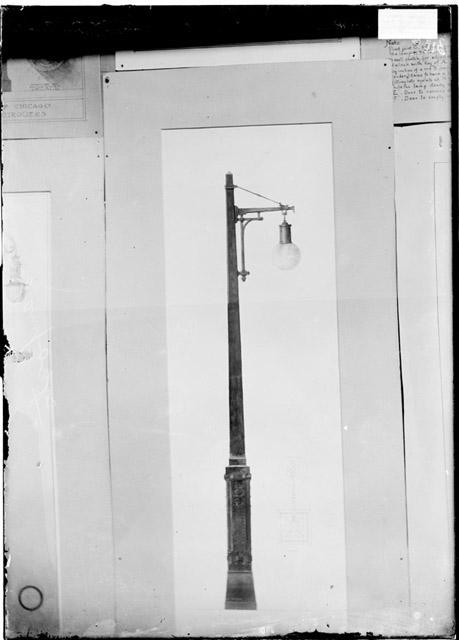 ECC | [Drawing of a lamppost with a tall base and a globe hanging