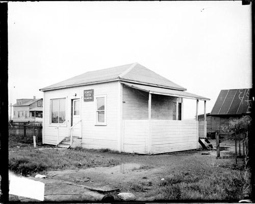 ECC | [Forest View Village Hall, a small white house in Forest Vie