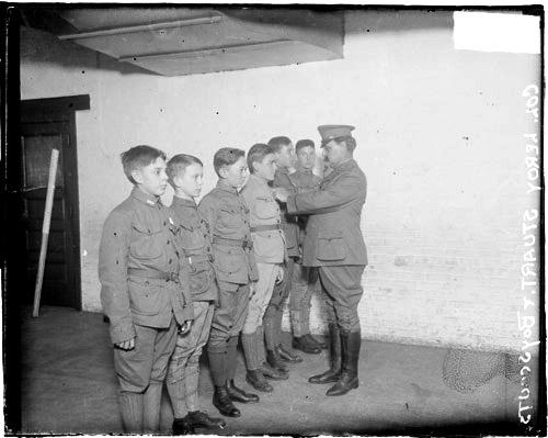 ECC | [Colonel Leroy T. Steward with a group of Boy Scouts in a ro