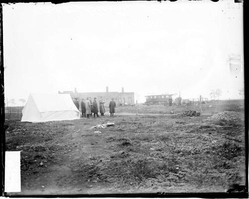 ECC | [Captain George Streeter's home, with police tent in field i