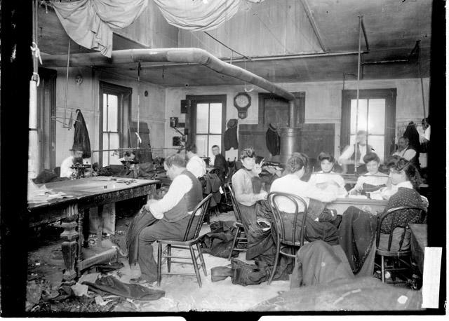 ECC | [Sweatshop at 132 Maxwell Street, women and men sewing at va
