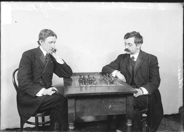 ECC | [Chess players Lasker and Marshall, sitting at a table in fr