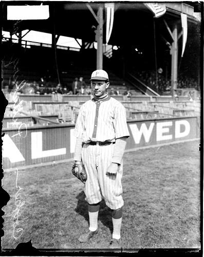 ECC | [Baseball player, Cooper, Pirates, standing in front of gran