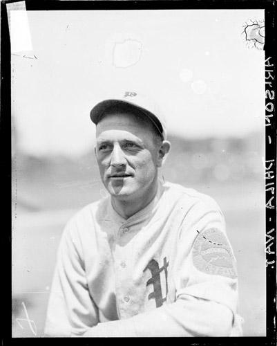 ECC | [Baseball player, Hal Carlson, Cubs, kneeling on the field a