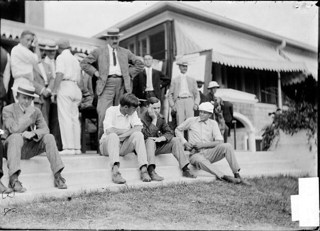 ECC | [Golf grounds, Onwentsia Country Club, men sitting and stand