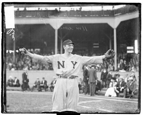 ECC | [Baseball player Arthur Devlin, New York Giants, holding his