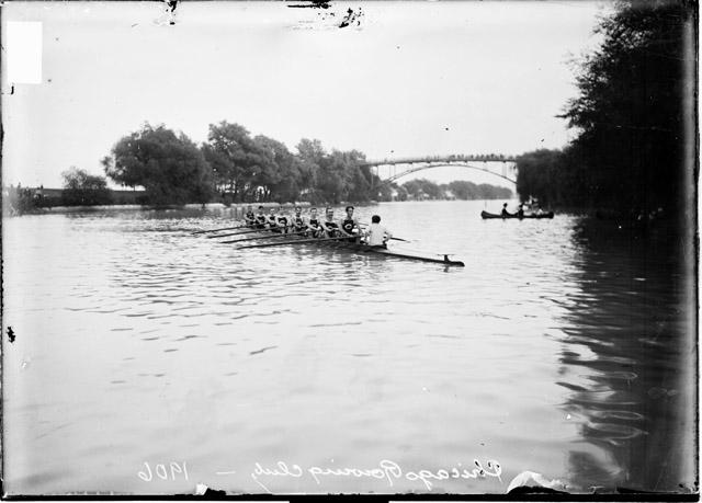 ECC | [Lincoln Park Rowing Club members in a shell on the water in