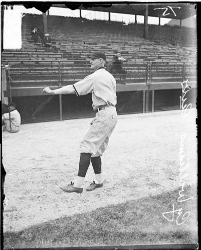 ECC | [Baseball player, Cubs, Williams throwing ball on field at W