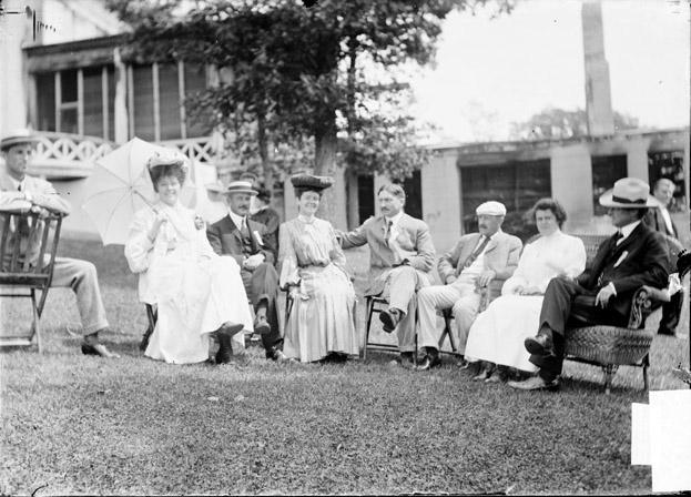 ECC | [Golf Course, Exmoor Country Club, women and men sitting in