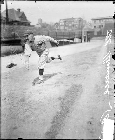 ECC | [Baseball player, Al Demaree throwing ball on field at Weegh