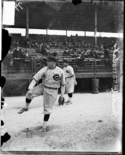 ECC | [Baseball player, Chicago Cubs, Hendrix throwing ball on fie