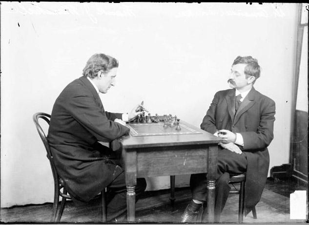 ECC | [Chess players Lasker and Marshall, sitting at a table in fr