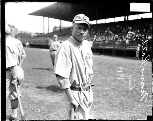 ECC | [Baseball player Rath, Cincinnati Reds, leaning on a basebal