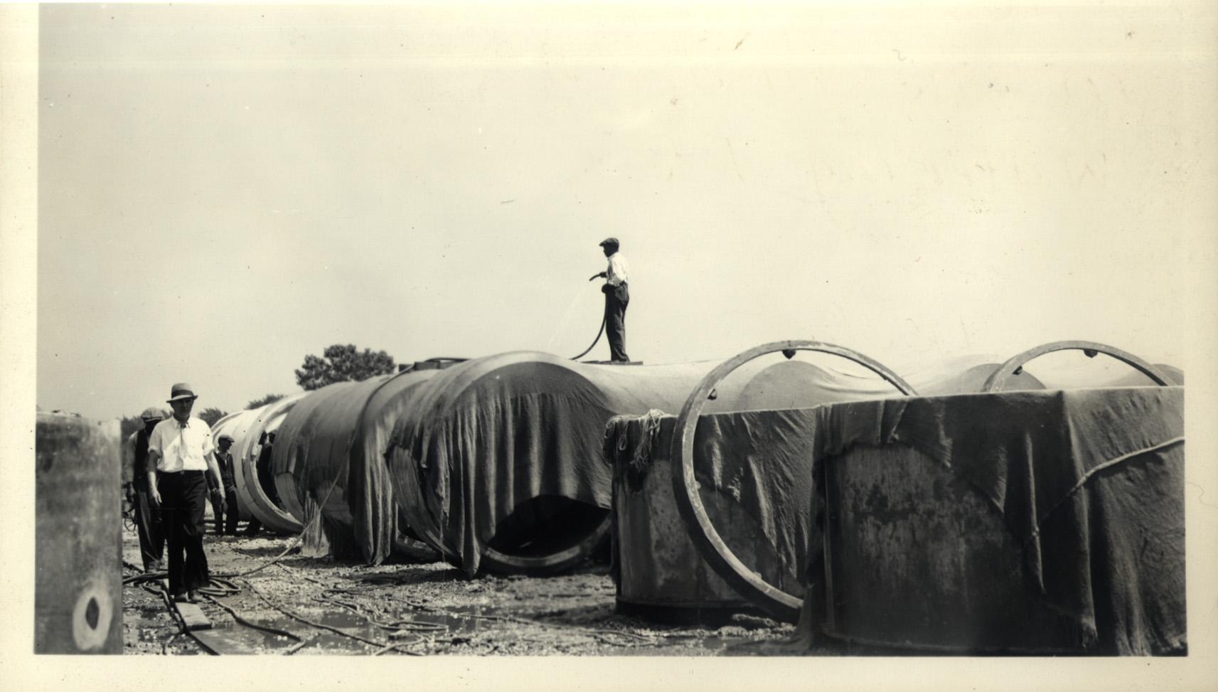ECC | 103rd Street and Rockwell Street, Pipe Yard, watering pipe,