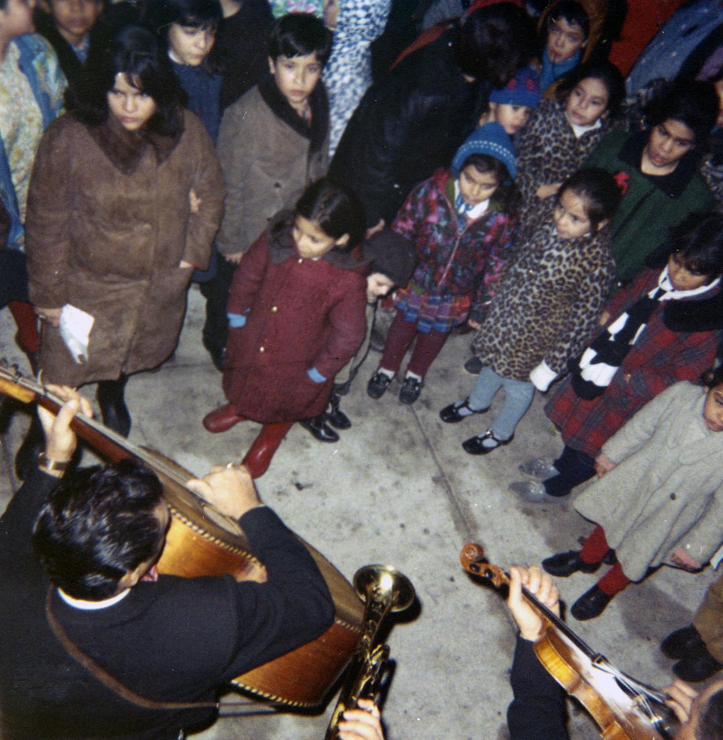 ECC | Children and adults watching a music performance