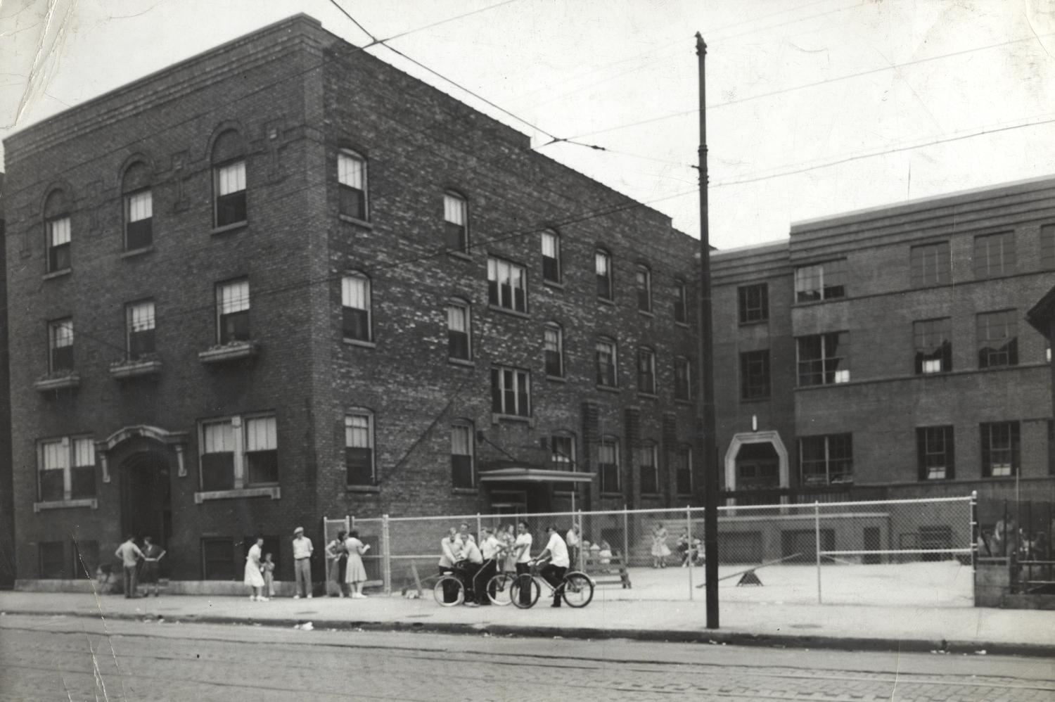 ECC | Teenagers gathering outside of Howell House