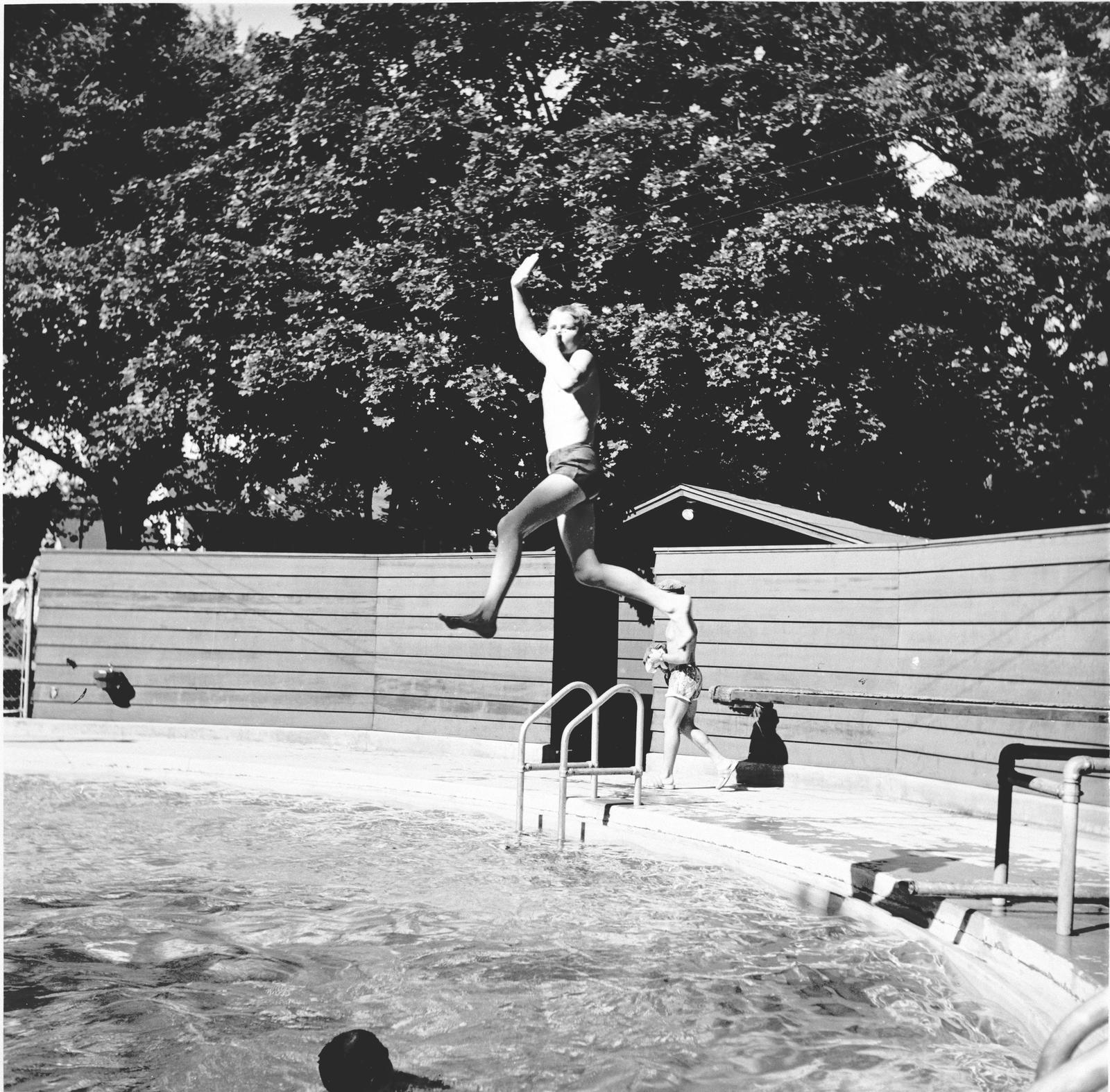 ECC | Boy jumping into pool