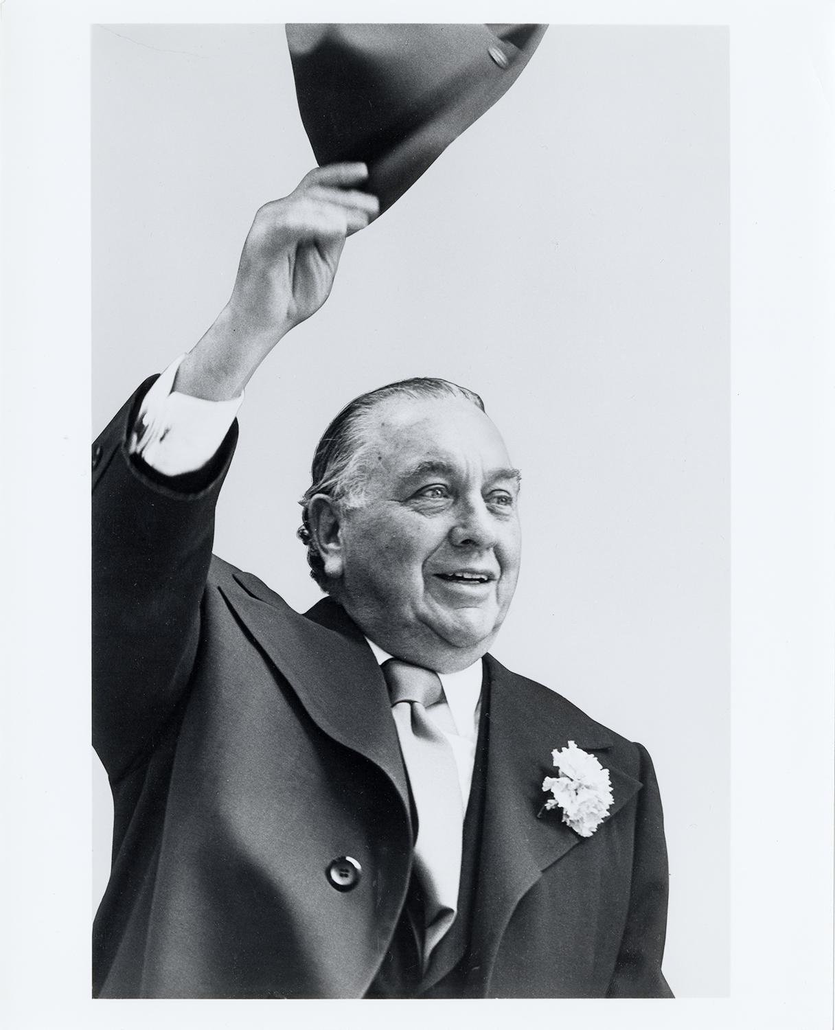 ECC | Portrait of Richard J. Daley wearing a carnation and doffing