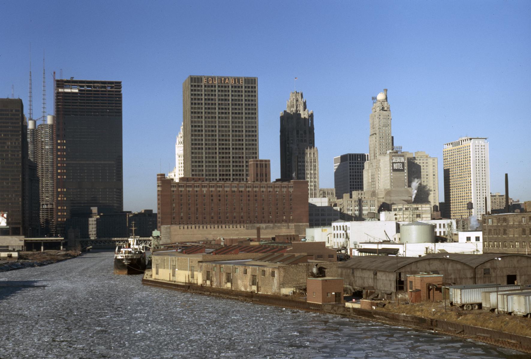 ECC | Industrial land along the Chicago River with skyline behind