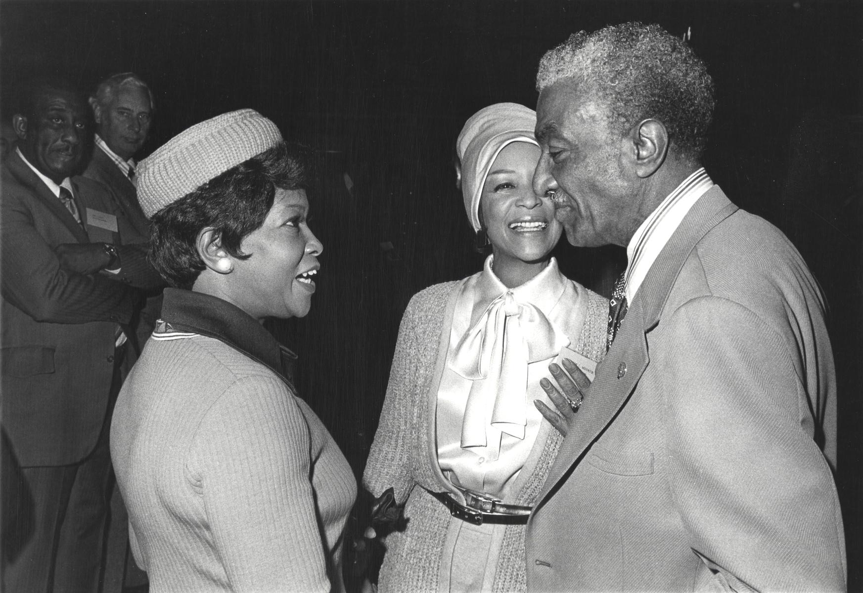 ECC | Congressman Ralph H. Metcalfe greets Addie Wyatt and Bernadi