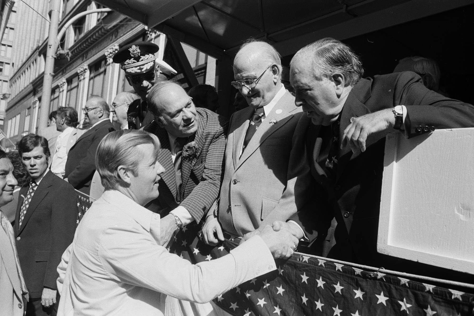 ECC | Congressman Frank Annunzio shaking hands with others